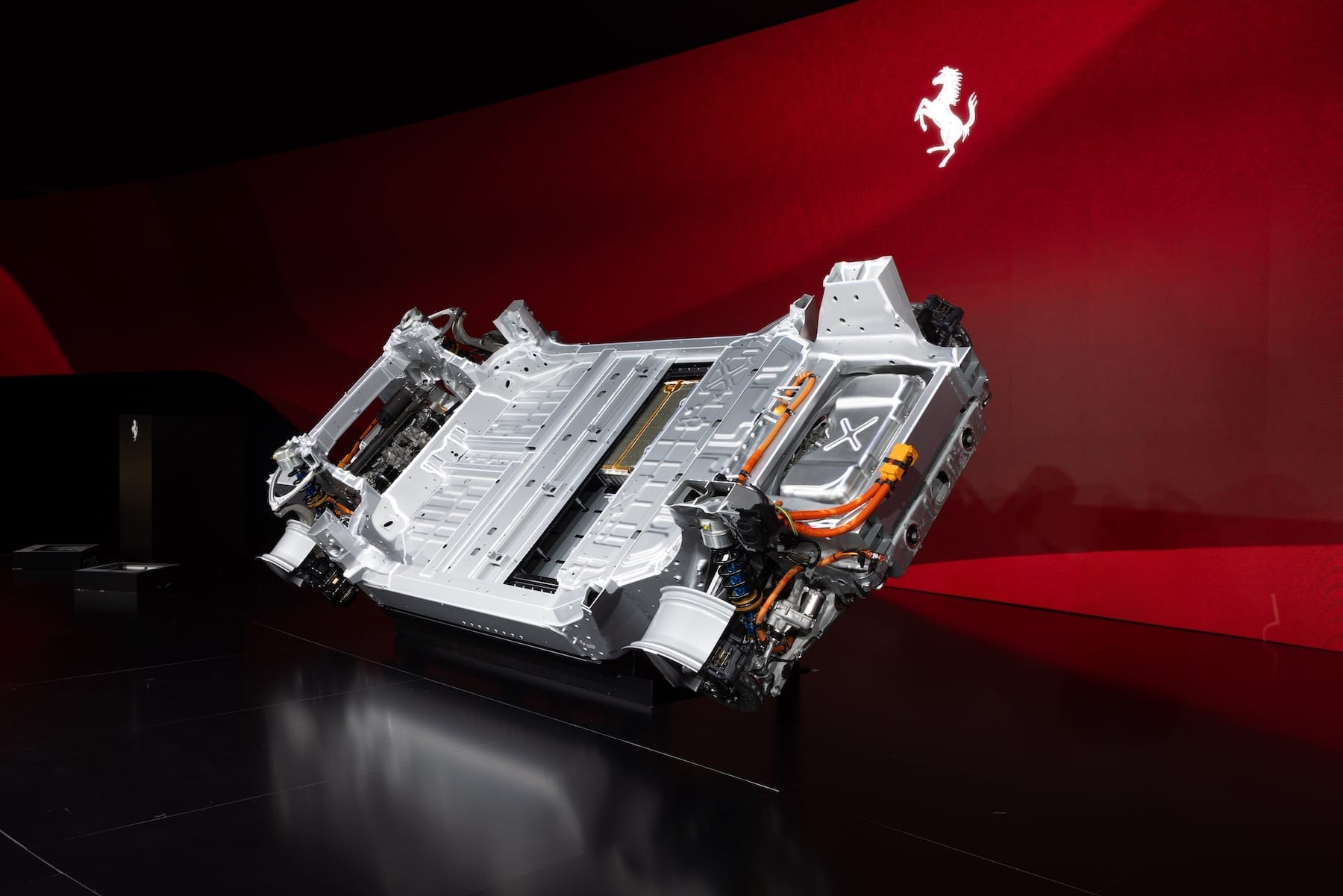 Ferrari unveils chassis and technology for its first electric car ...