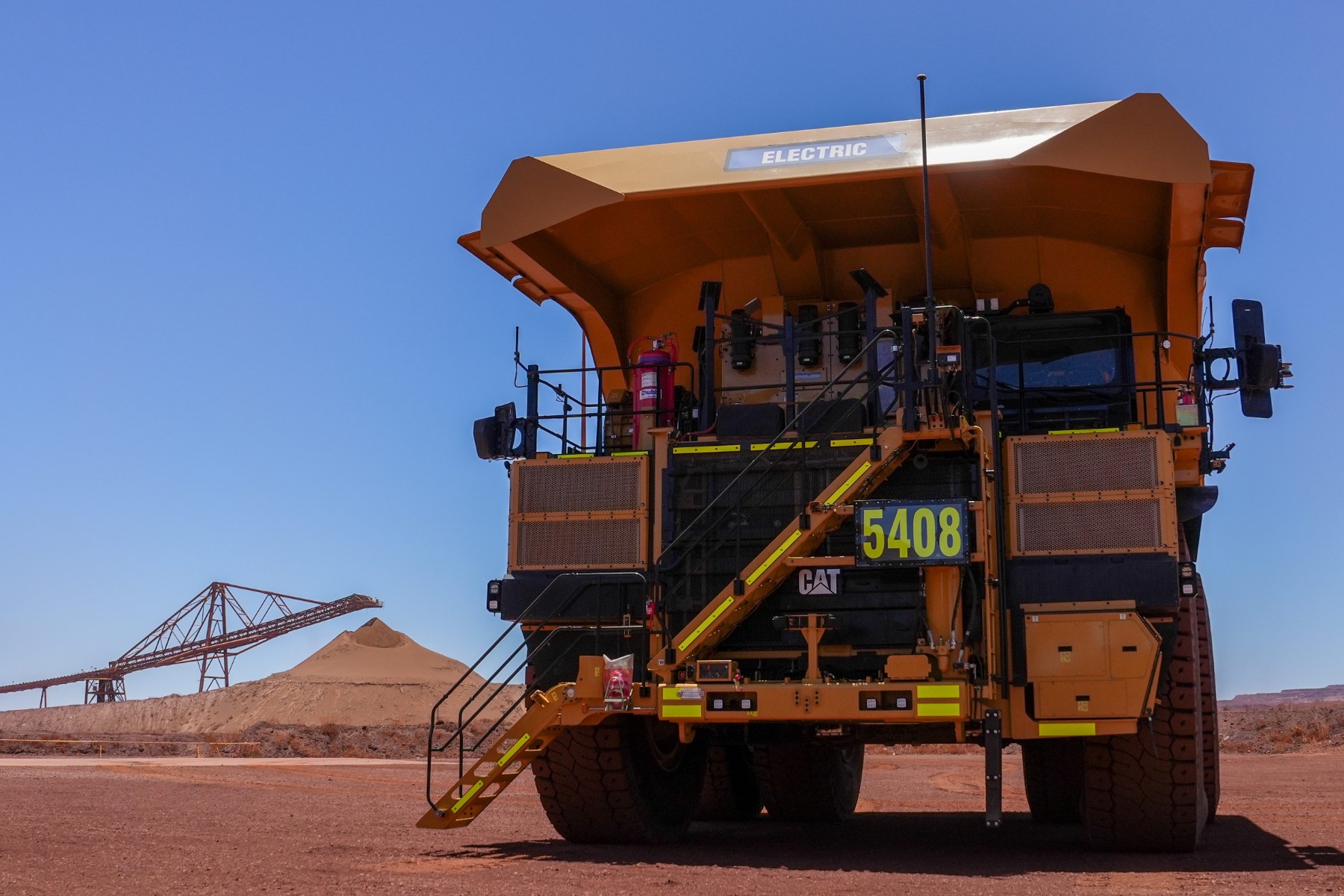 BHP and Rio Tinto begin battery-electric haul truck trials in Australia ...